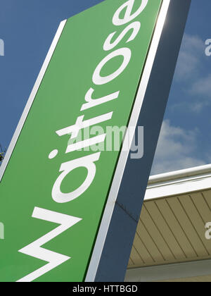 Waitrose opening hours sign Stock Photo - Alamy