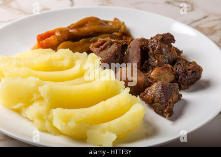 Juicy and fresh traditional Romanian pork ribs chops or "scaricica de ...
