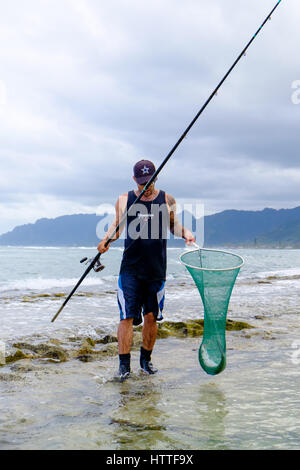 LAIE, HAWAII - FEBRUARY 24, 2017: Fisherman Jameson Humalon competes in ...