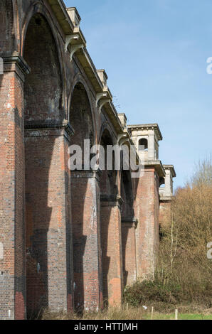 View along the brick arches of the Balcombe Railway Viaduct in West ...