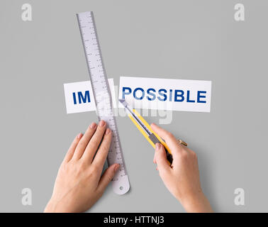 Impossible Unbelieveable Hand Cut Word Split Concept Stock Photo - Alamy