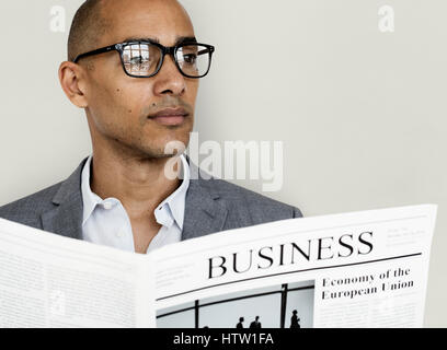 African Descent Business Man Newspaper Concept Stock Photo - Alamy