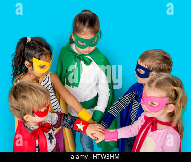 Little Kids Superhero Hands Together Teamwork Stock Photo - Alamy