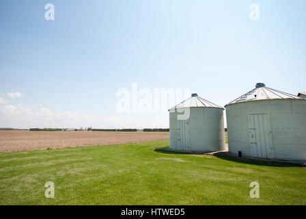 Seed storage bins on a commercial corn farming operation in rural ...