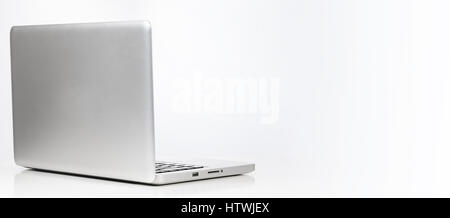 Macbook Pro laptop computer rear view with Apple logo on the lid ...