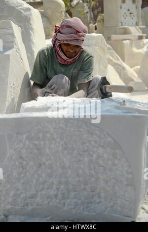 Man making stone sculpture Stock Photo - Alamy