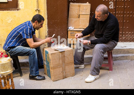 Arab men playing cards in the old city of Jerusalem Stock Photo - Alamy