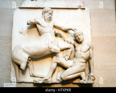 Marble metope from the south side of the Parthenon, showing the battle between Centaurs and ...