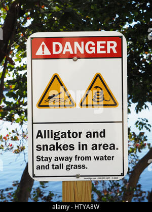 Alligator and Snakes Warning sign Stock Photo - Alamy