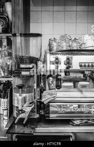 white cup and sugar dispenser Stock Photo - Alamy