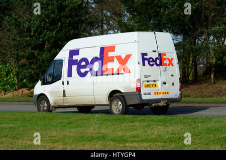 FedEx Ford Transit delivery van UK Stock Photo - Alamy