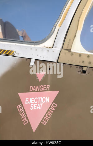 Danger aircraft jet ejector seat rescue and intake signs on side of ...