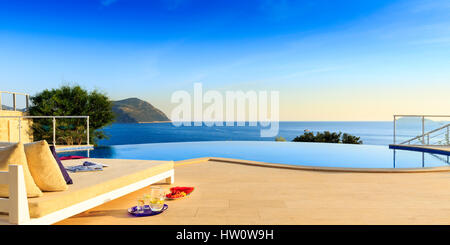 Kalkan sunset with infinity pool, Turkey Stock Photo - Alamy
