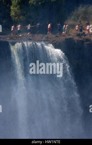 Tourists on Devil Pool in Victoria Falls on zambezi river, discovered ...