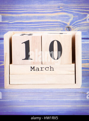 March 10. Day 10 of month, Cube calendar with date, empty frame on ...