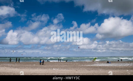 A surfer in Klitmoller which is a popular surfing destination in ...