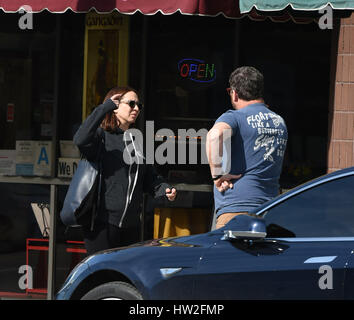 Maya Rudolph has an animated improv conversation with a friend ...