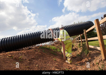 Drainage pipework being installed under a new section of the A5 near ...