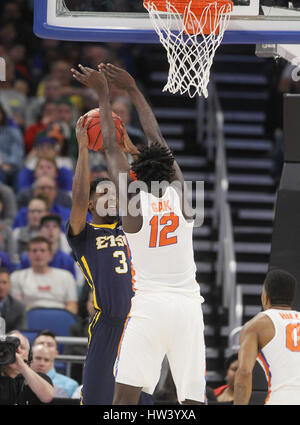 East Tennessee State forward David Burrell (3) shoots over Florida ...