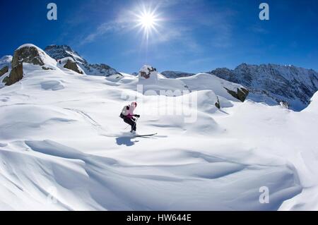 Italy, Piedmont, Val Pellice, skier hiking below the neck Manzol ...