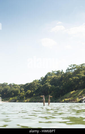 Summer underwater handstand Stock Photo - Alamy