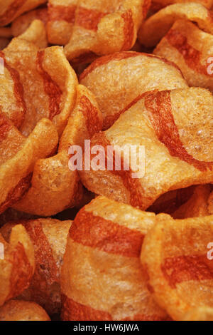Bacon flavored party snacks chips Stock Photo - Alamy