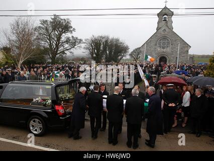 The coffin arrives for the funeral of Captain Dara Fitzpatrick, who ...