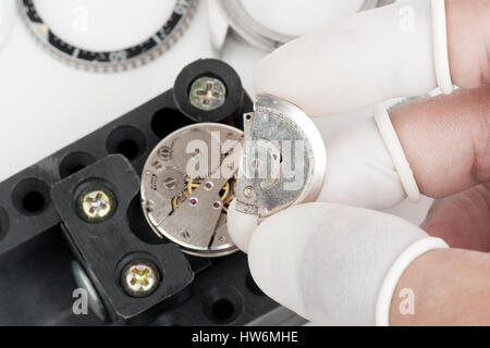 watchmaker repairing the automatic wristwatch, watch repairing concept ...