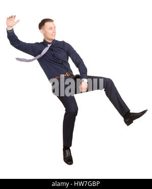 Scared businessman in a falling position (isolated on white Stock Photo ...