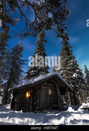 wooden cottage in the woods with starry milky way at night in the sky ...