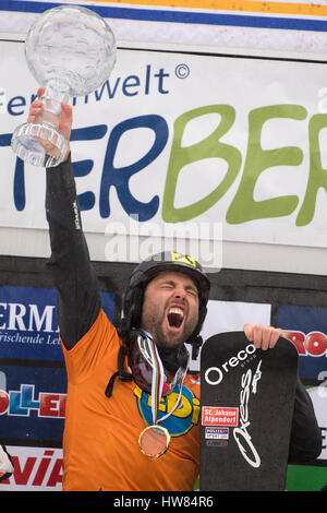 World Cup overall men's 2017 champion Austria's Marcel Hirscher holds a ...