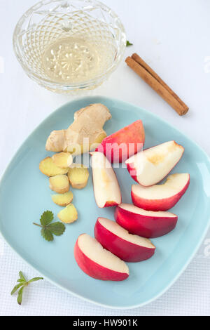 Red apples and ginger slices Stock Photo - Alamy
