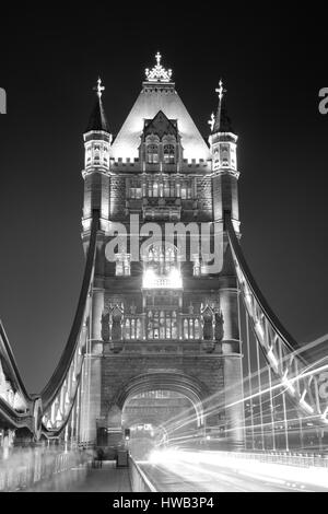 Tower Bridge in London with busy traffic at night Stock Photo - Alamy