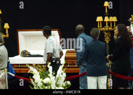 Mourners view the casket of singer Ray Charles at the Los Angeles ...