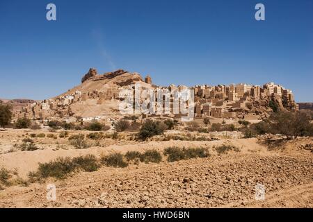 Yemen, clinging to the cliff, one of the many magnificent adobe ...