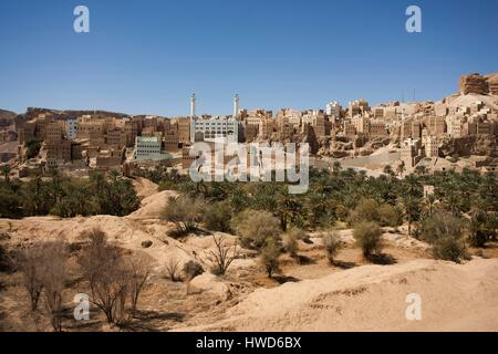 Yemen, clinging to the cliff, one of the many magnificent adobe ...