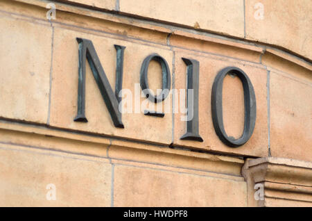 Number 10, ten, street number sign on the wall Stock Photo - Alamy