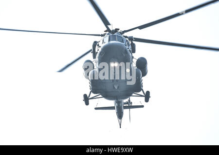Photograph of a helicopter capture from below of it Stock Photo - Alamy