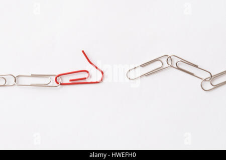 Broken chain made of paper clips meaning failure in teamwork Stock ...