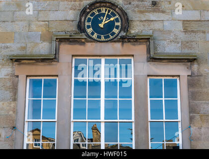 Clock on the face of the Corn Exchange building Bristol which has two ...
