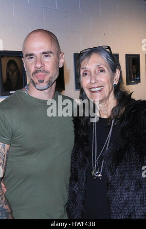 Guests attend Alex Sapienza's photography exhibition titled 'Everything ...