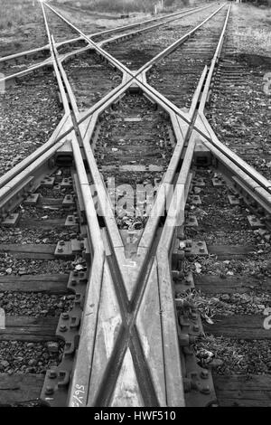 Merging railroad tracks, in black and white Stock Photo - Alamy