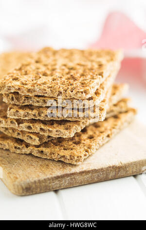 The healthy crispbread on cutting board Stock Photo - Alamy