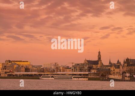 Belgium, Antwerp, city riverfront view from the Scheldt River, dusk ...
