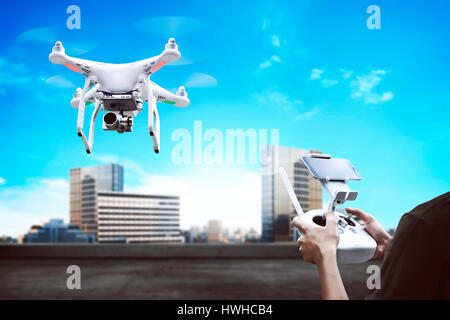 Male pilot controlling drone Stock Photo - Alamy