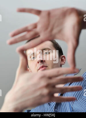 Portrait of minded clever man hand touch chin look interested empty ...