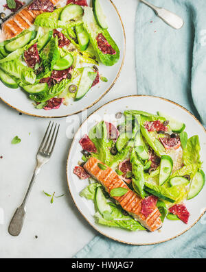 Spring fresh salad with blood orange, lettuce, spinach and sesame seeds ...