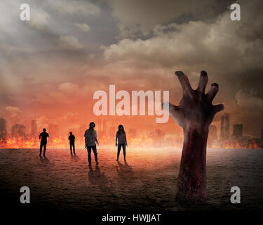 Hand rising out from the grave Stock Photo - Alamy