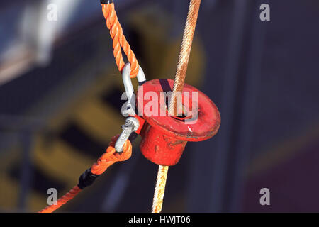 Yacht detail of stainless steel fairlead with side rollers on a large ...