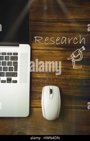 Overhead view of sports equipment with computer technology and money ...